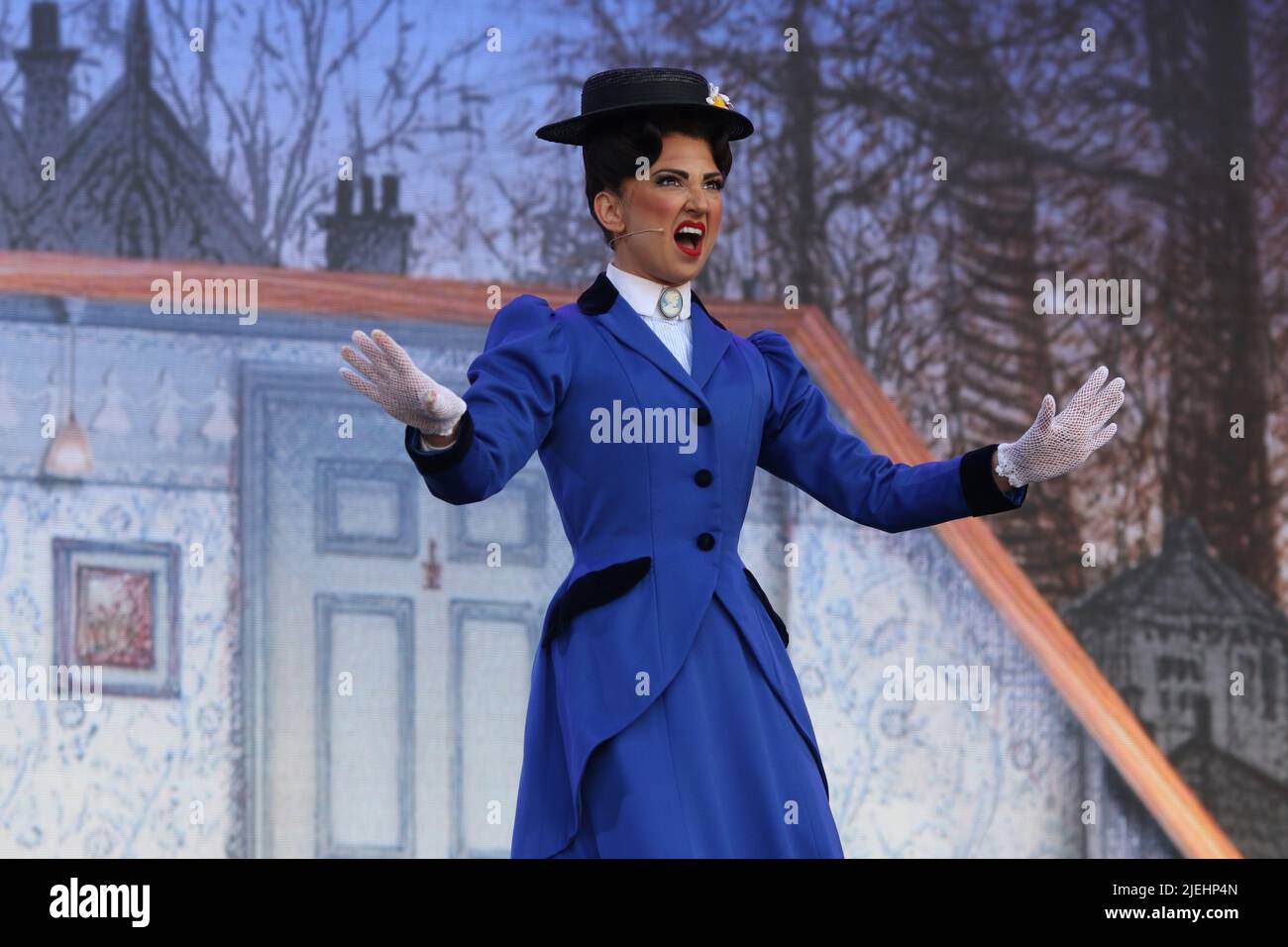 Zizi Strallen playing the lead role of Mary Poppins along with the cast ...