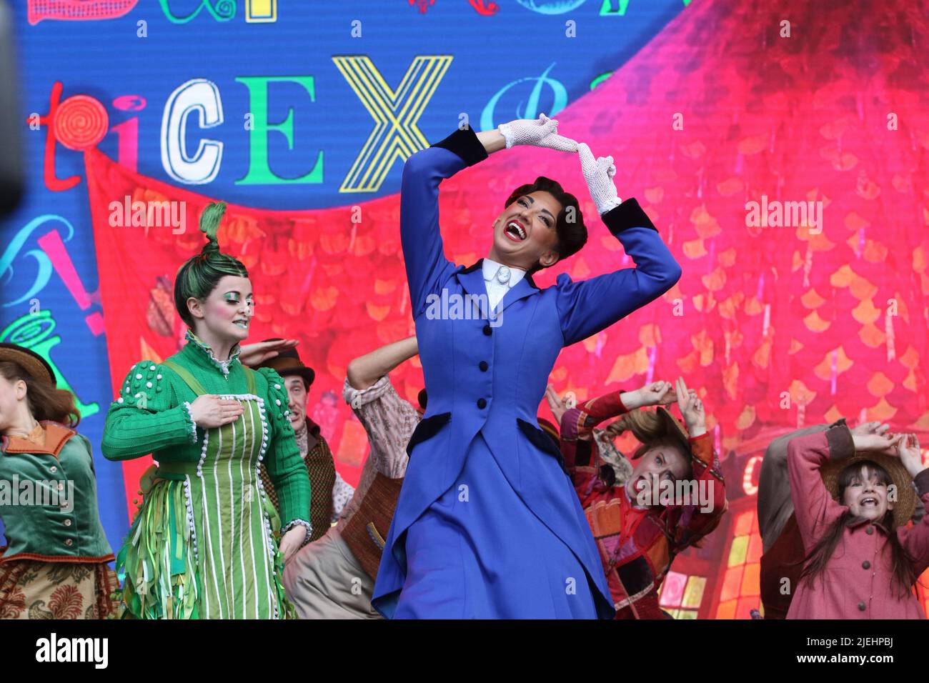 Zizi Strallen playing the lead role of Mary Poppins along with the cast ...