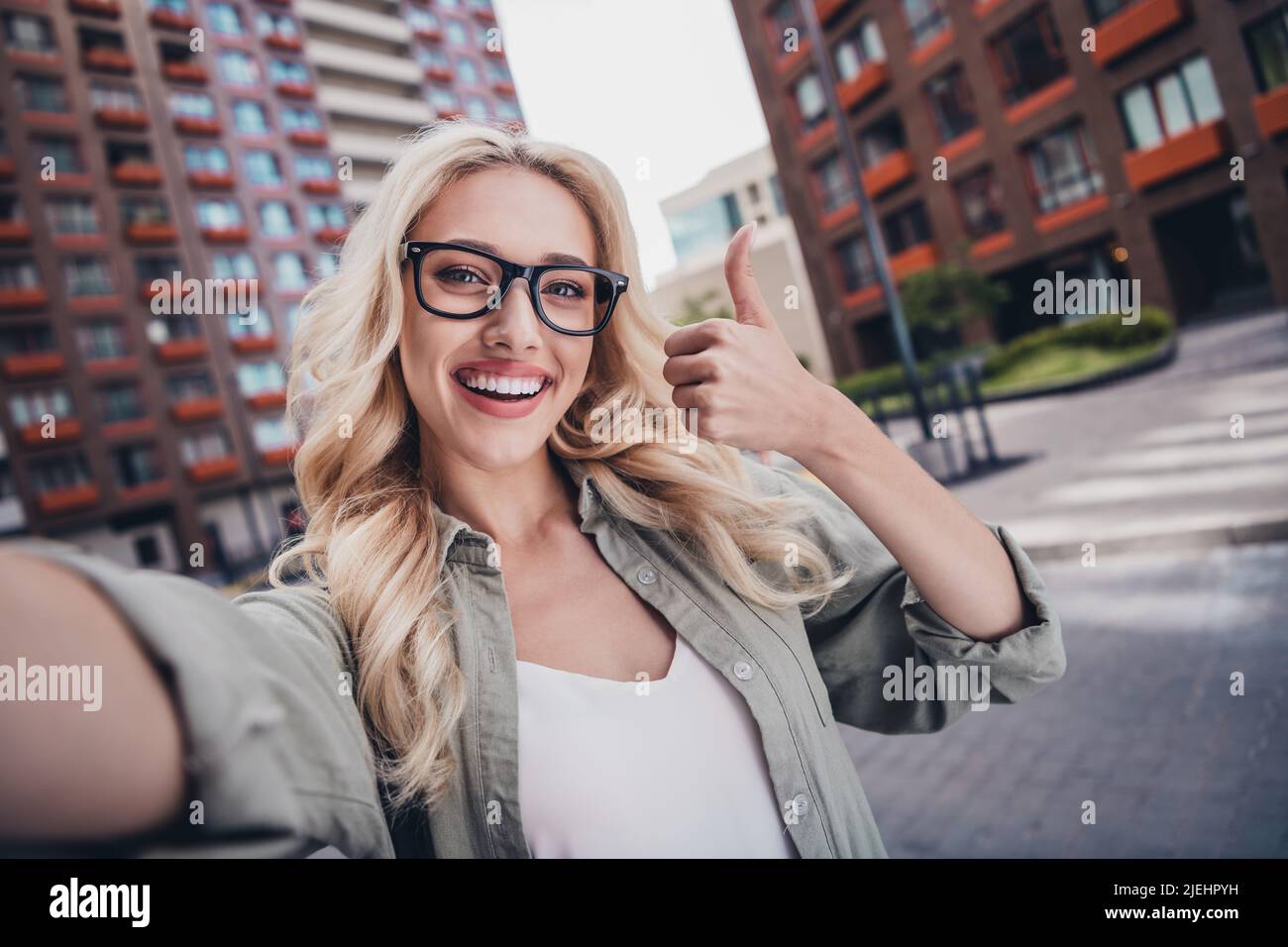 Portrait of pretty curly hairstyle lady make selfie hand finger ...