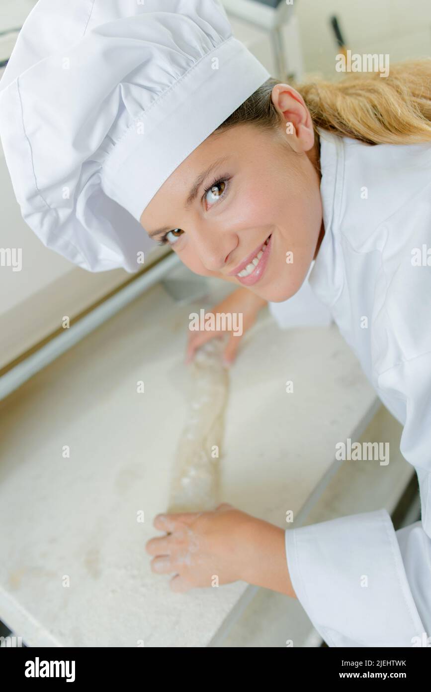 a lady chef rolling pastry Stock Photo - Alamy