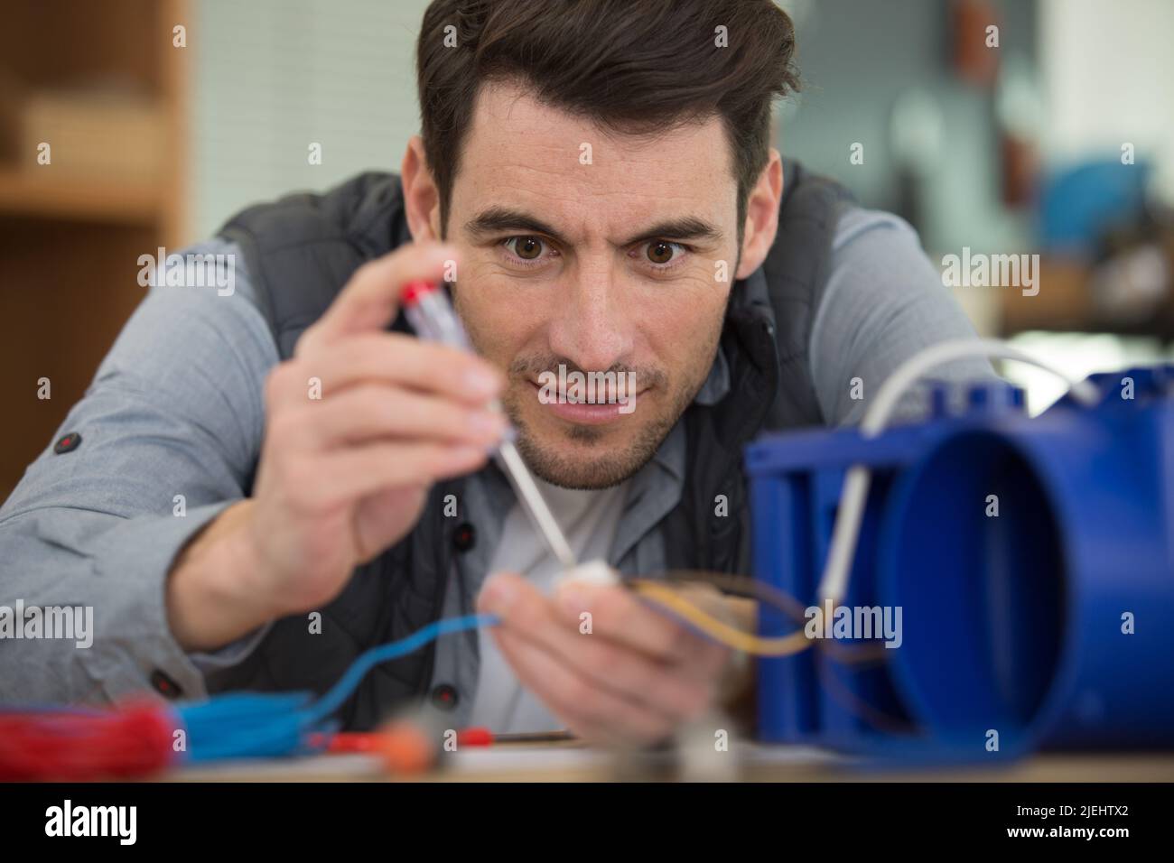 electrical installer working in an electrical box Stock Photo - Alamy