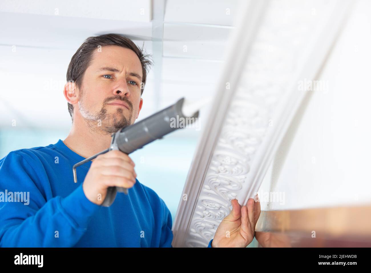Installing baseboards hi-res stock photography and images - Alamy