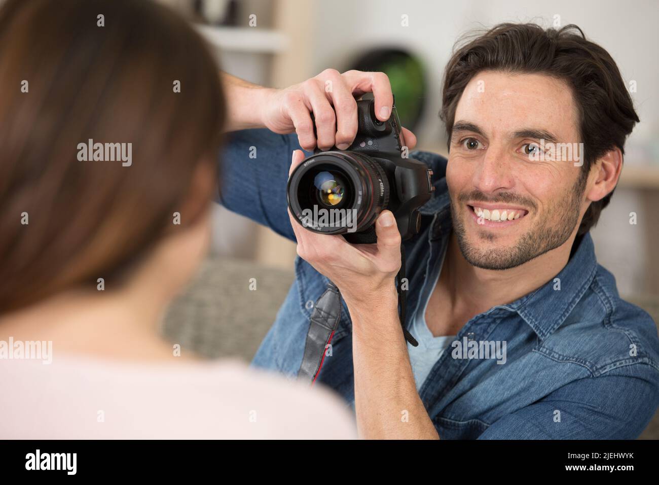 photographer and model working in modern lighting studio Stock Photo ...