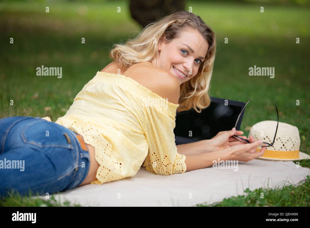 Pretty girl lay on hi-res stock photography and images - Alamy