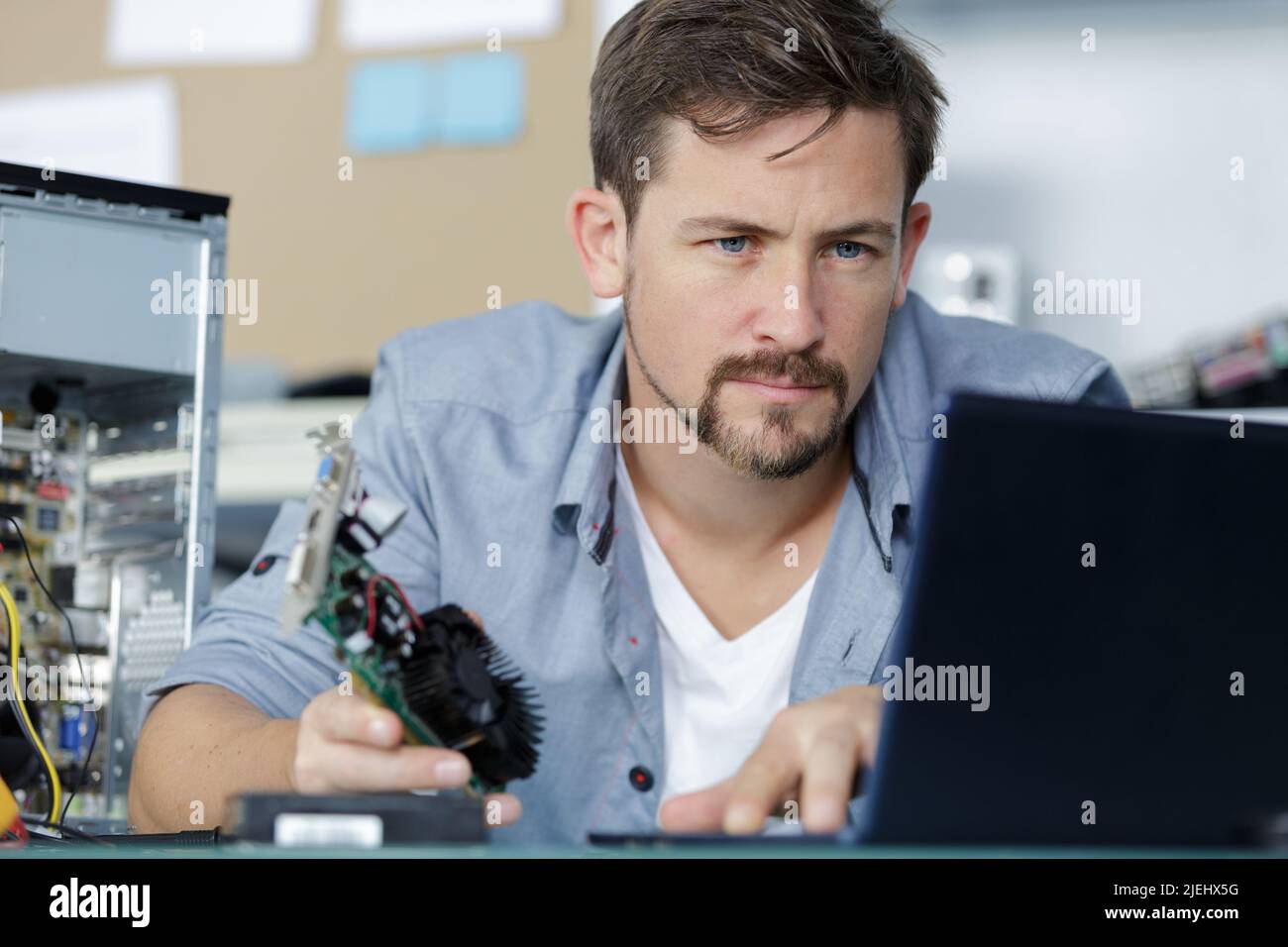 Computer repairman working on hi-res stock photography and images - Alamy
