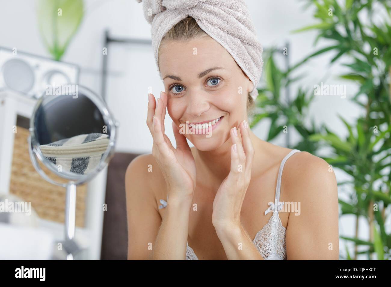 Close up girl applying cream hi-res stock photography and images - Alamy