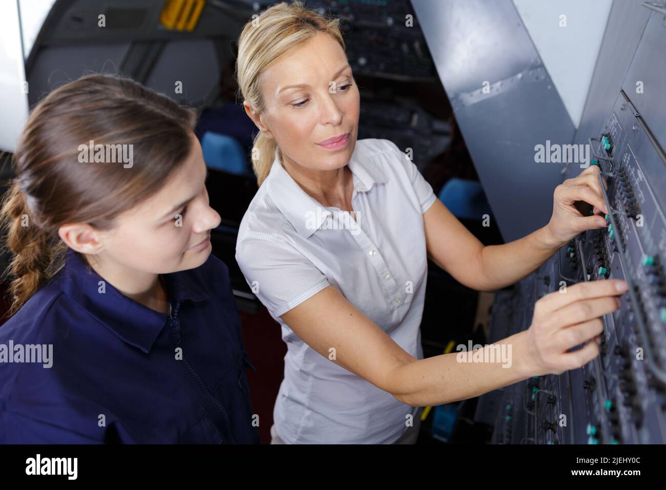 two woman engineers working together Stock Photo - Alamy