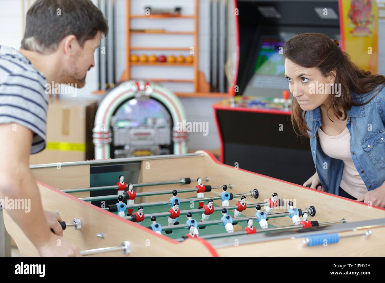 Two women playing table football hi-res stock photography and images ...