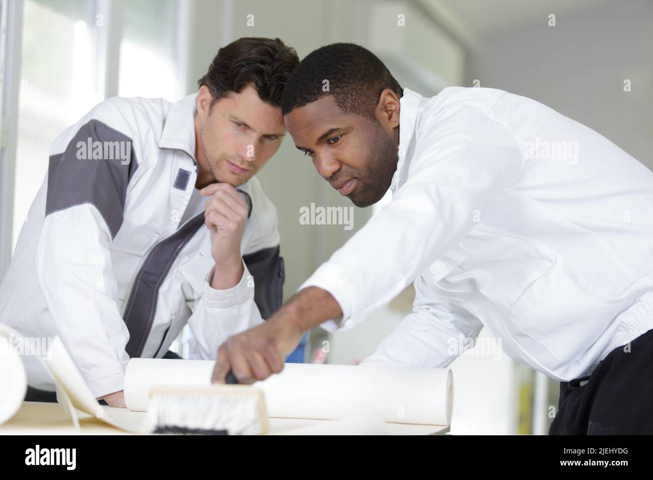 apprentice and teacher at work Stock Photo - Alamy