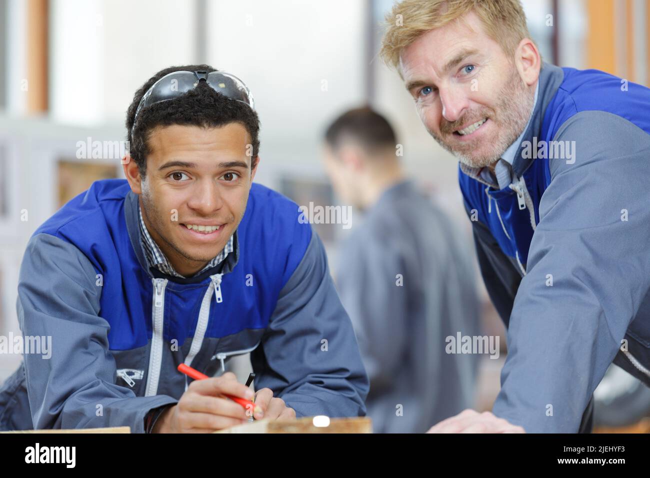 Joining together two men hi-res stock photography and images - Alamy