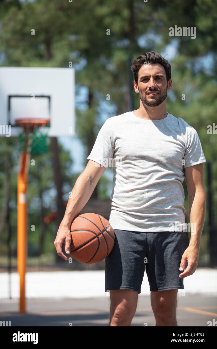 handsome male after playing basketball outdoor Stock Photo - Alamy