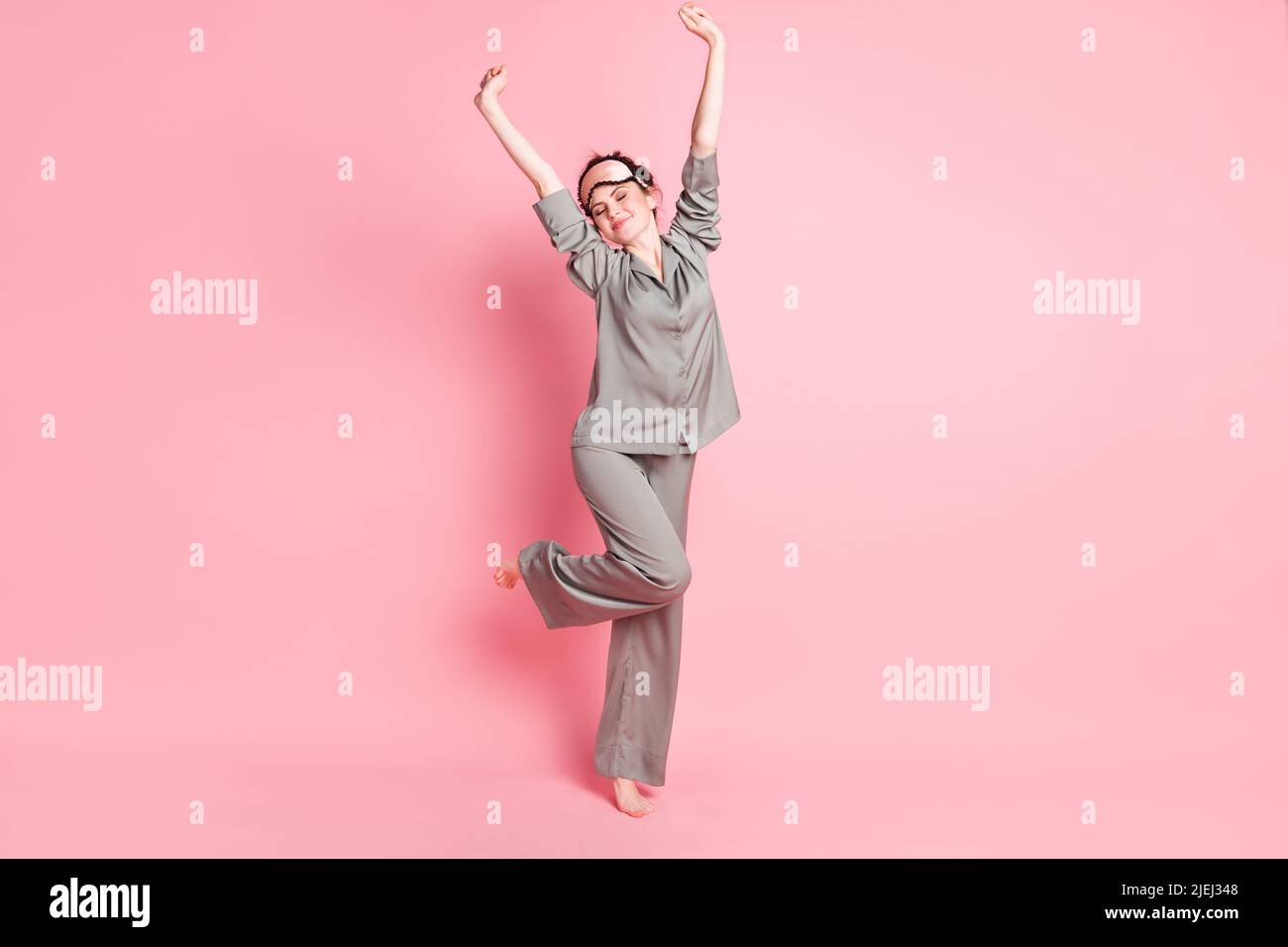 Full size portrait of pretty positive person closed eyes raise stretch ...