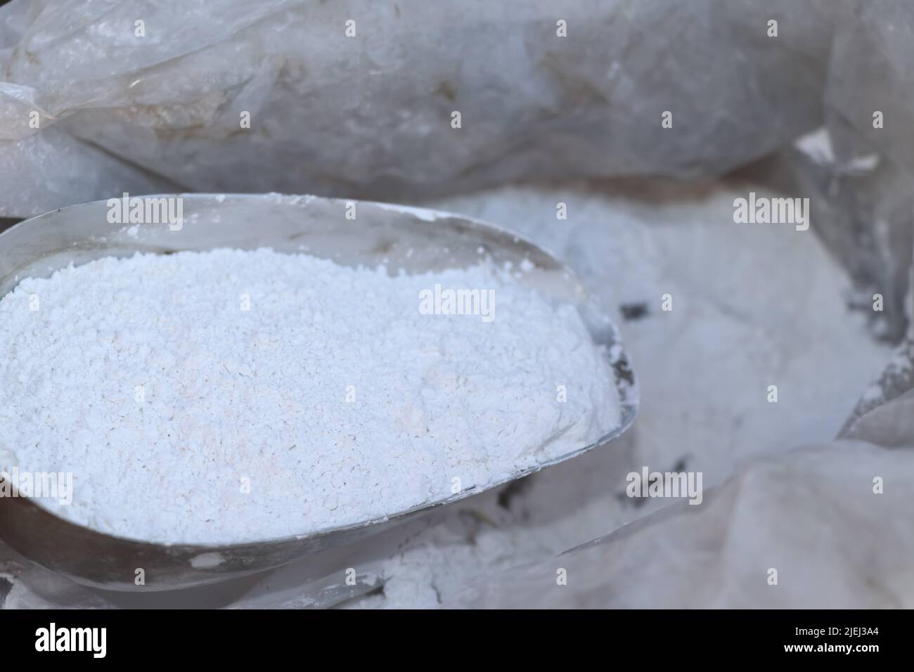 White calcium carbonate powder chemistry in factory Stock Photo - Alamy