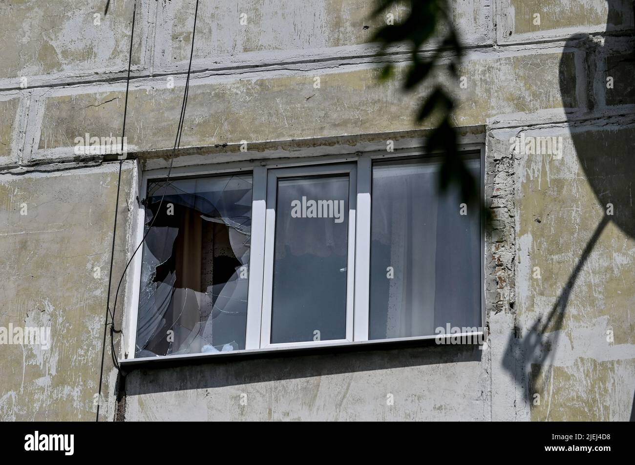 ORIKHIV, UKRAINE - JUNE 24, 2022 - A smashed window is pictured at a ...