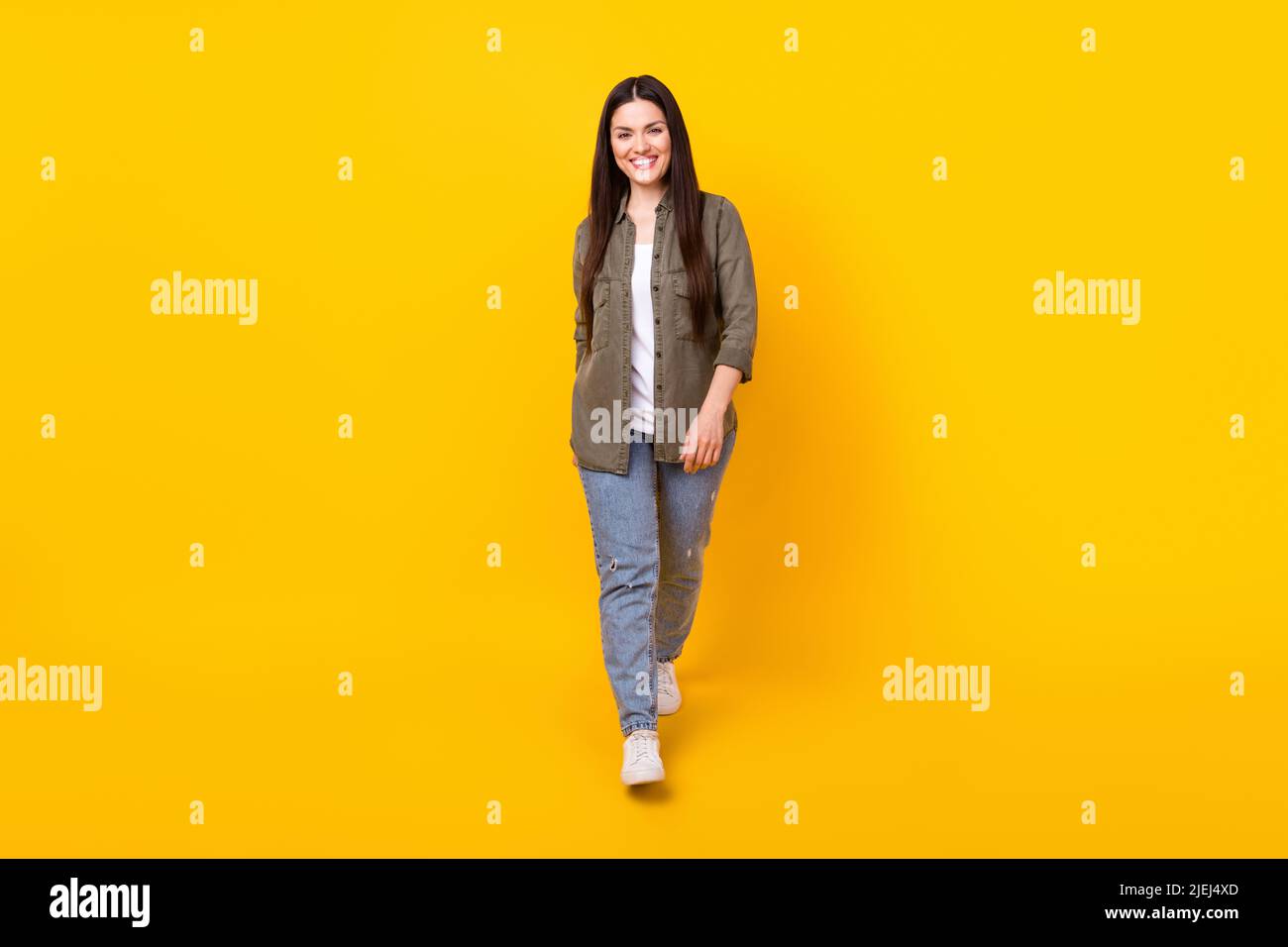 Full Length Photo Of Cheerful Nice Pretty Mature Woman Walk Weekend Smile Isolated On Yellow