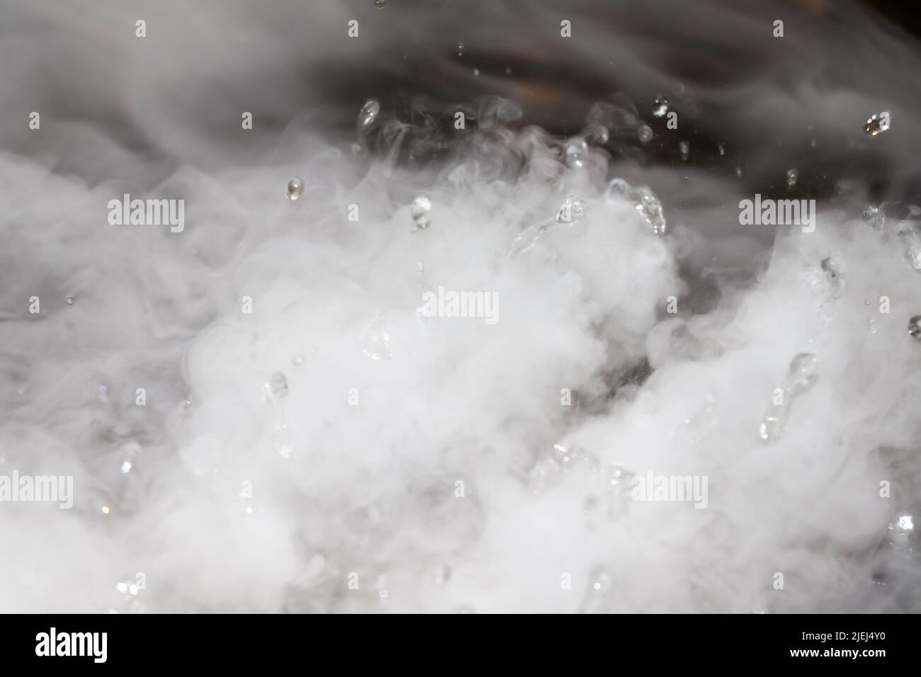 Fountains and white mist in winter and cool Stock Photo - Alamy