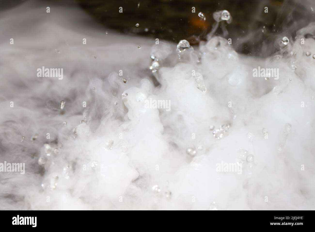 Fountains and white mist in winter and cool Stock Photo - Alamy