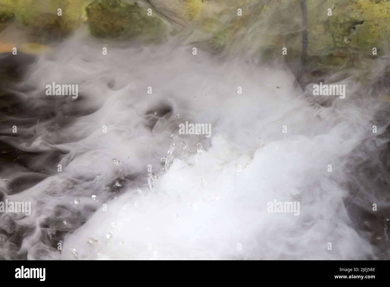 Fountains and white mist in winter and cool Stock Photo - Alamy