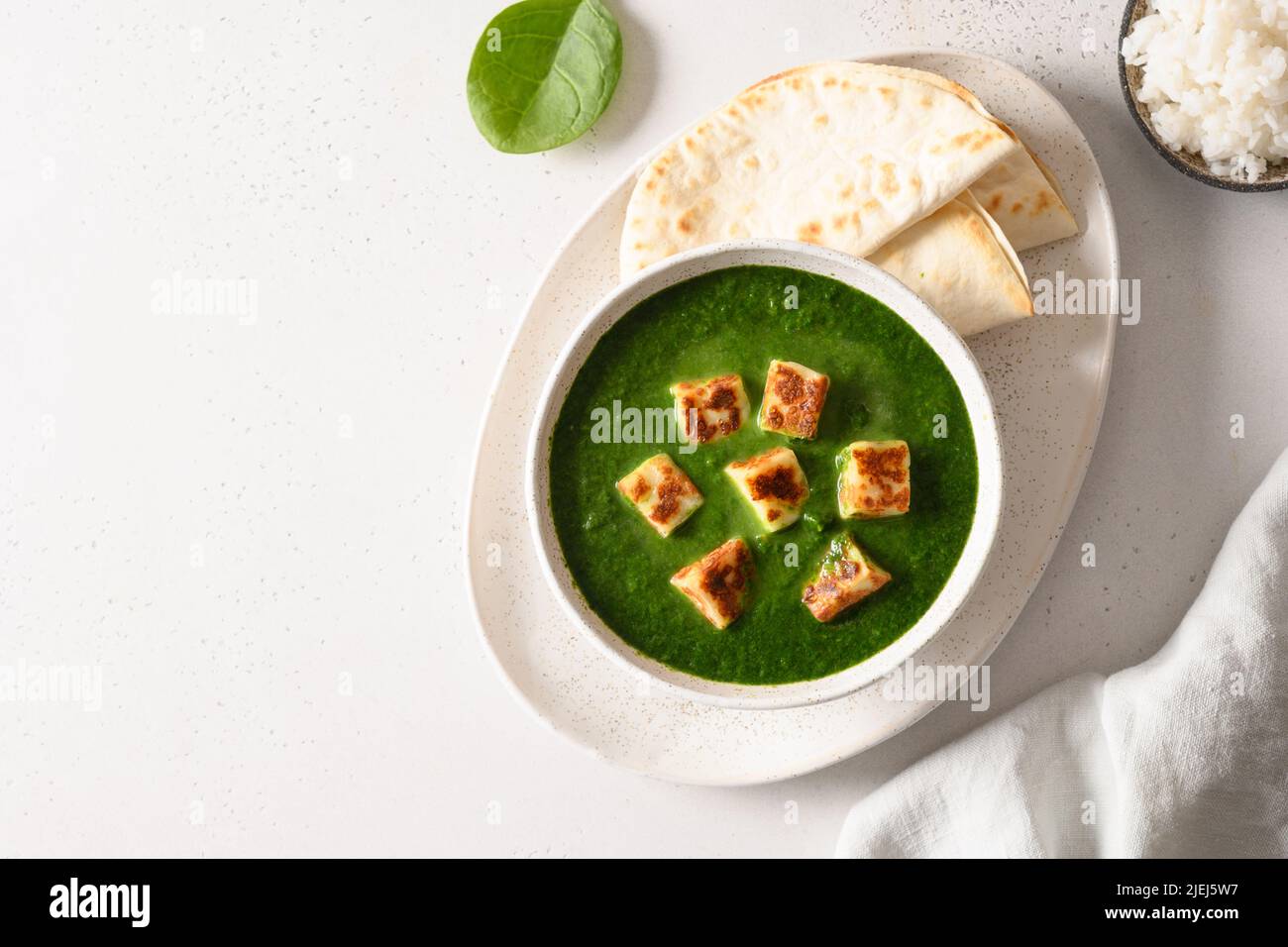 Palak Paneer with basmati rice and chapati on white background. Indian ...