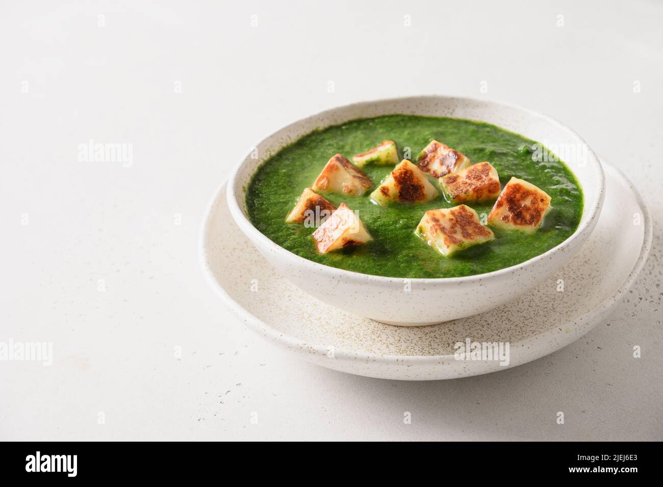 Palak Paneer served with chapati and basmati rice isolated on white ...