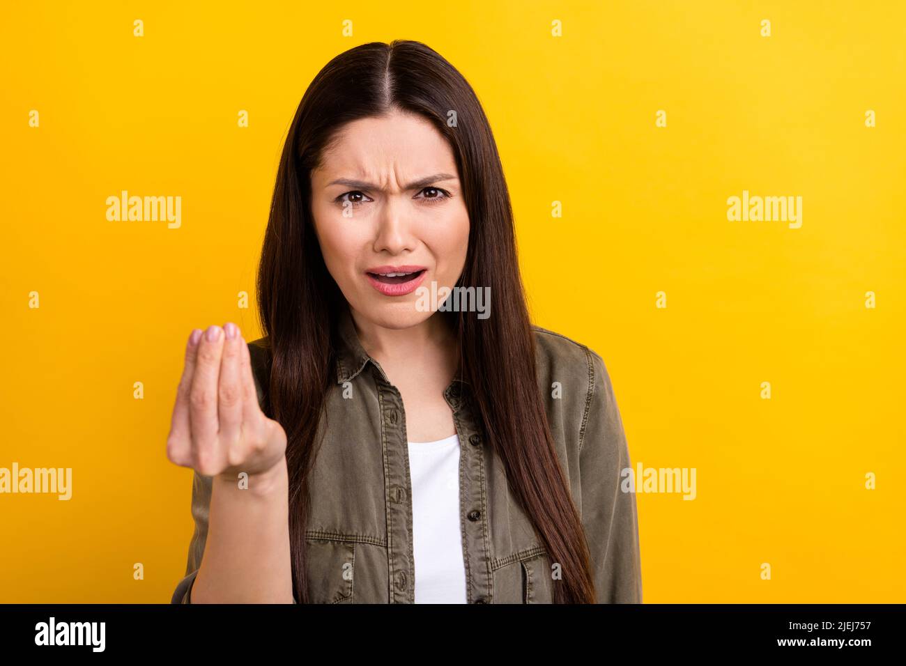Photo of angry unhappy furious mature woman make italian sign argument ...