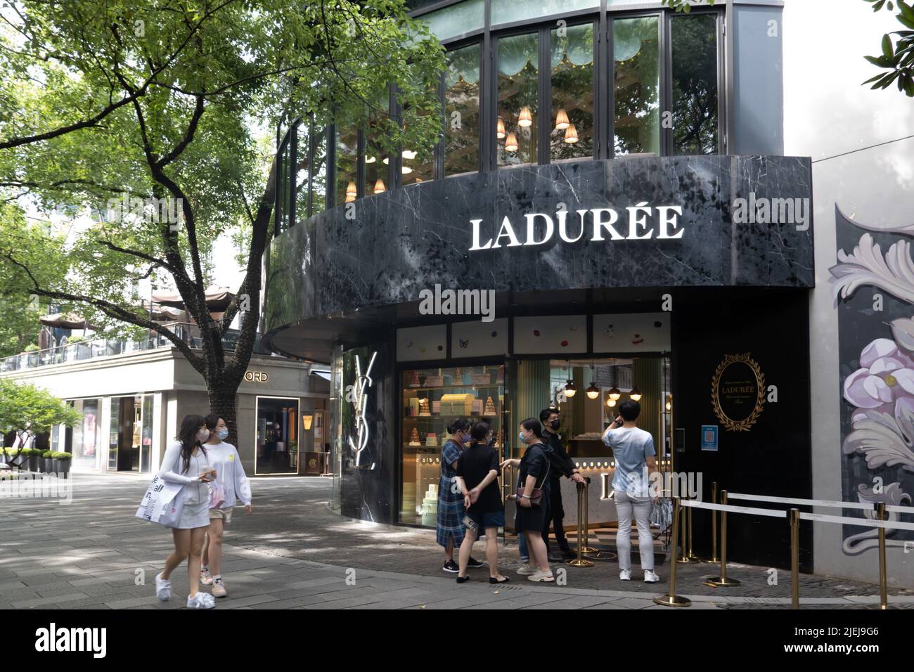 SHANGHAI, CHINA - JUNE 27, 2022 - Customers line up in front of Laduree ...
