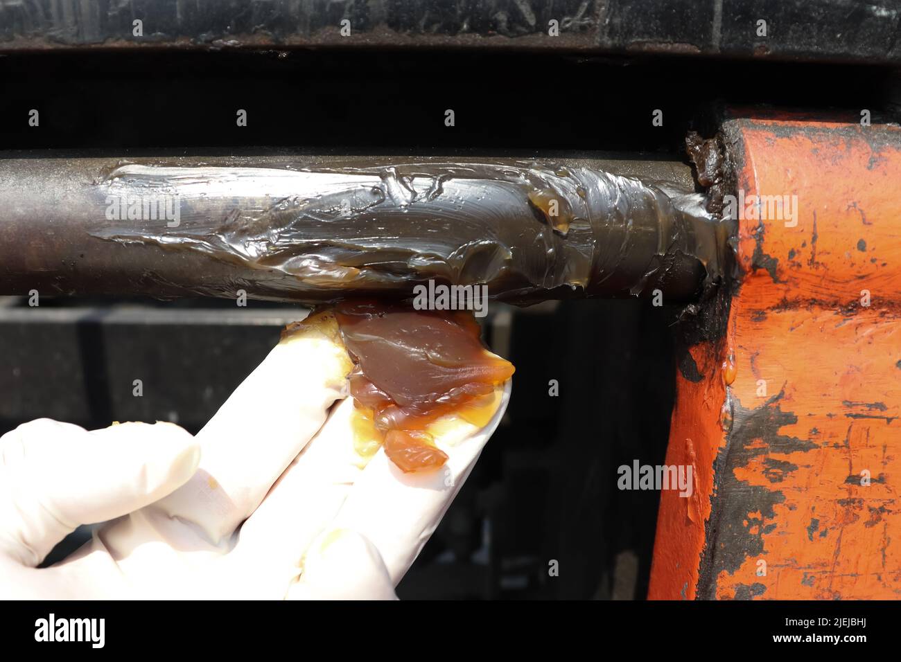 Grease used in industry for slippery materials Stock Photo - Alamy