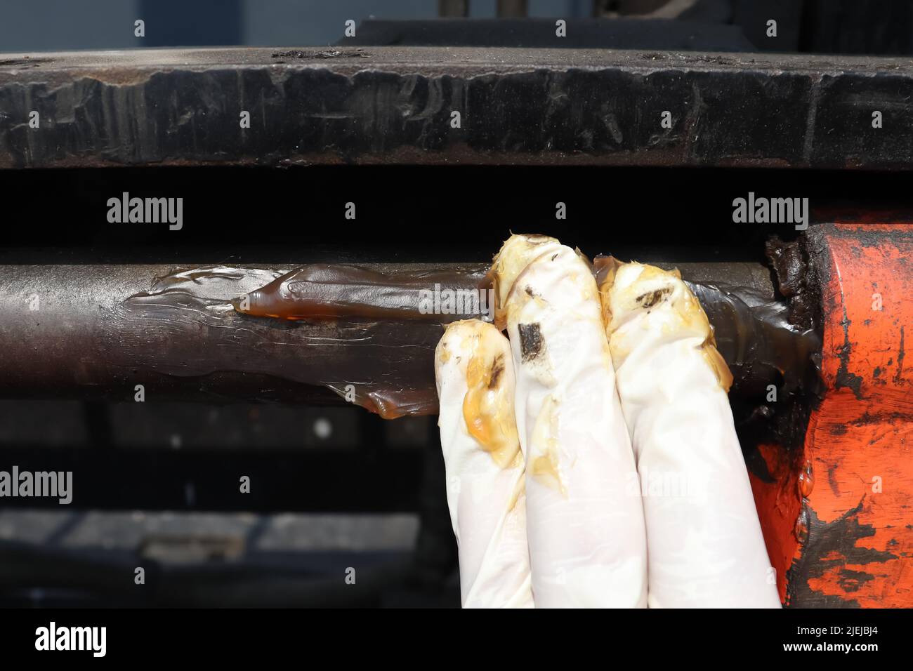 Grease used in industry for slippery materials Stock Photo - Alamy