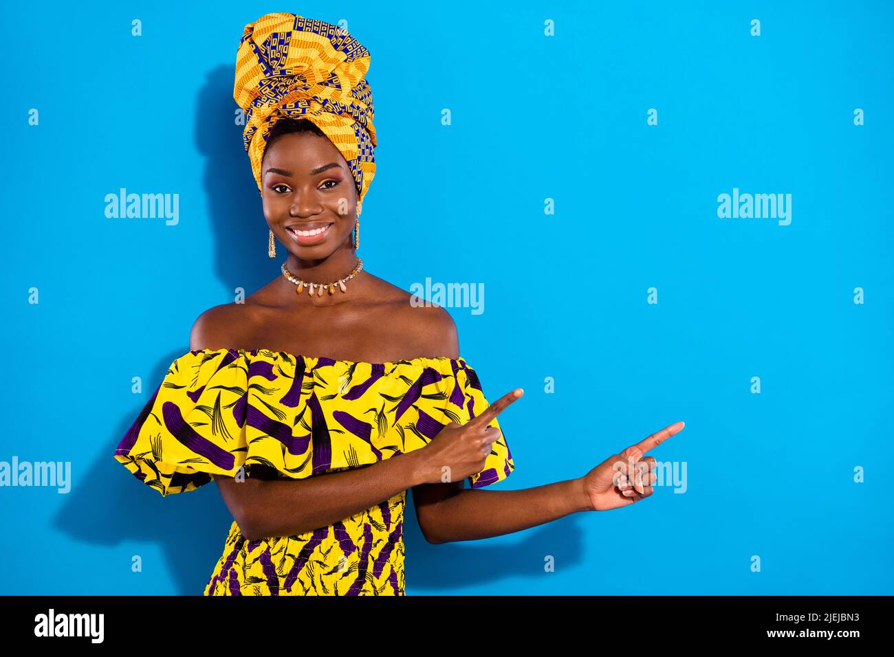 Photo of young beautiful smiling cheerful african woman advertising ...