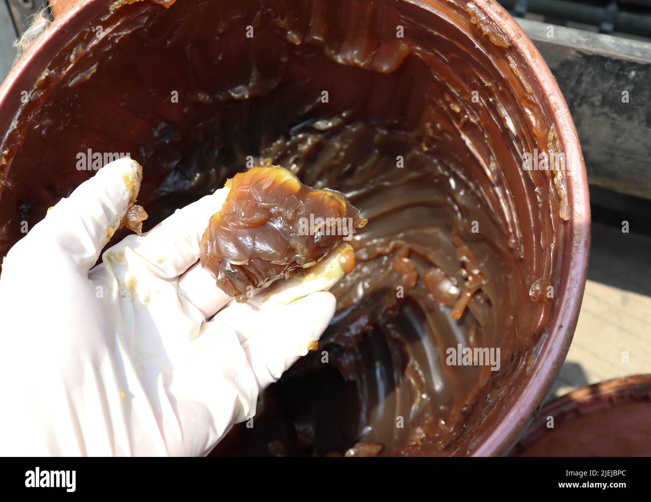 Grease used in industry for slippery materials Stock Photo - Alamy