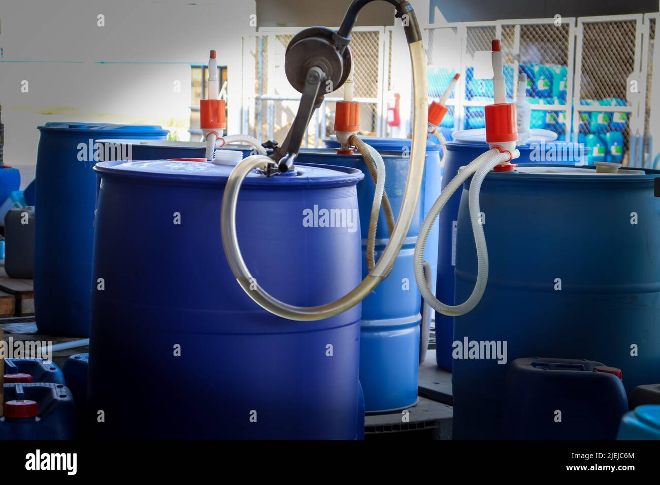Chemical tank in the factory and Pump Stock Photo - Alamy