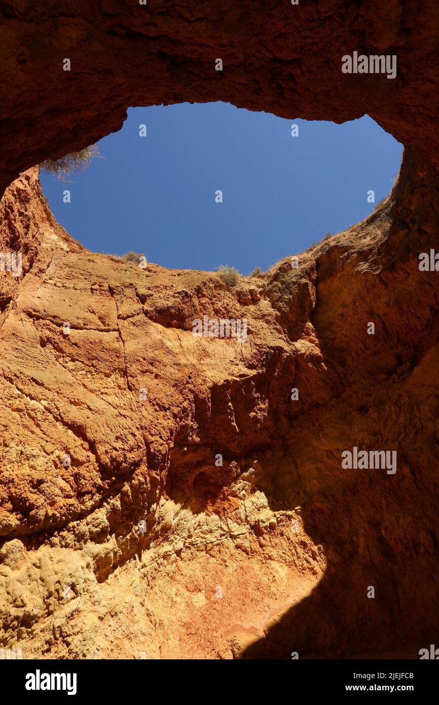 Hidden beach by the ocean sea with natural cave and sand Stock Photo ...