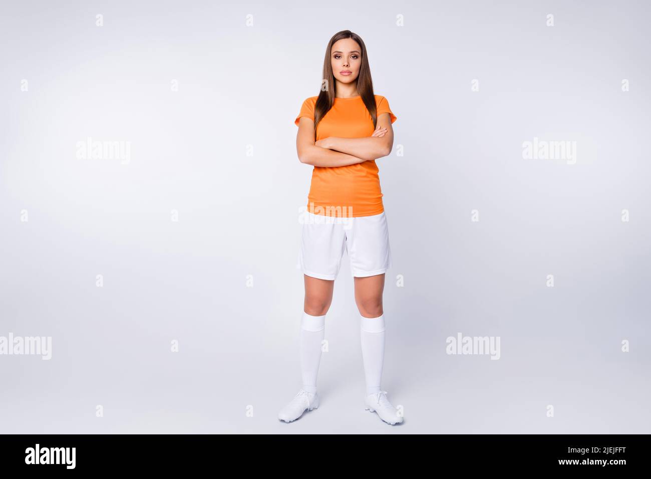 Full length photo of serious lady soccer team player euro 2020 ...