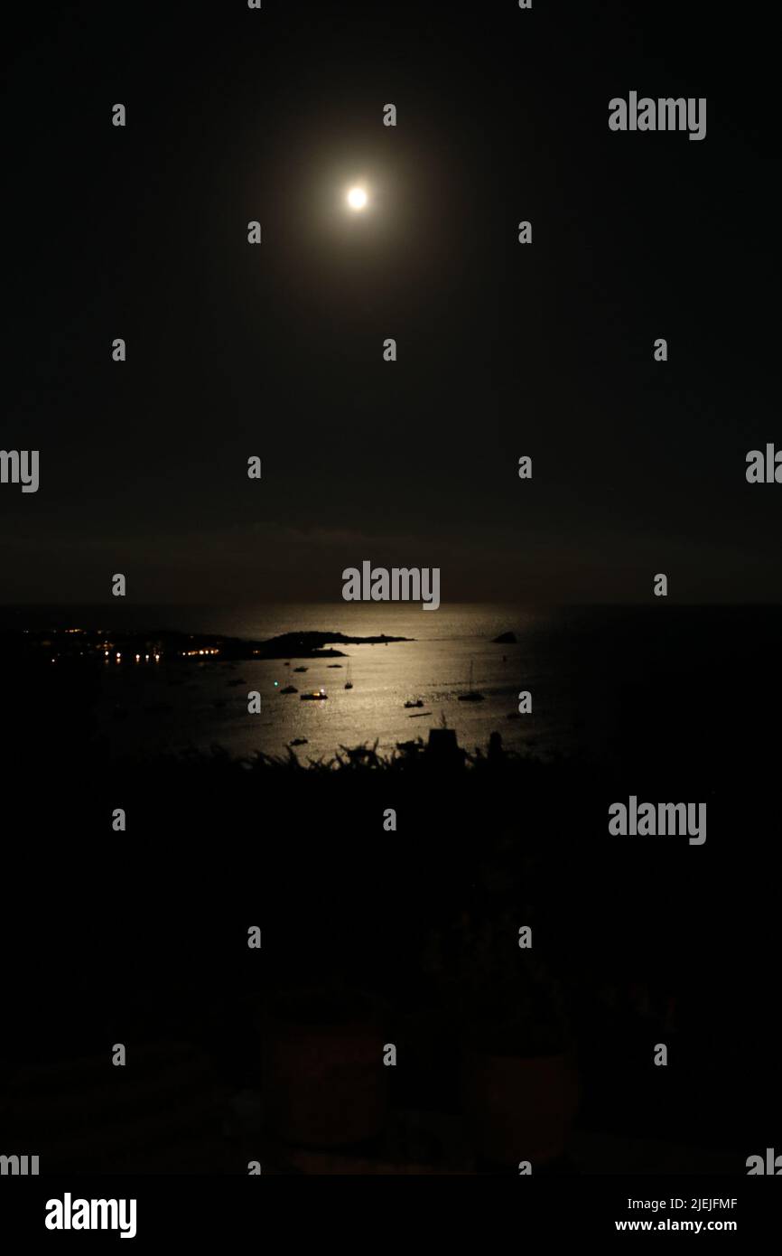 Full moon reflection on Ocean in Cadaques Stock Photo - Alamy