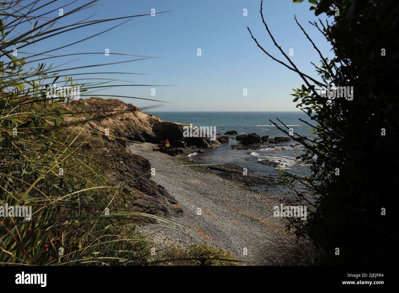 Hidden beach by the ocean sea with natural cave and sand Stock Photo ...