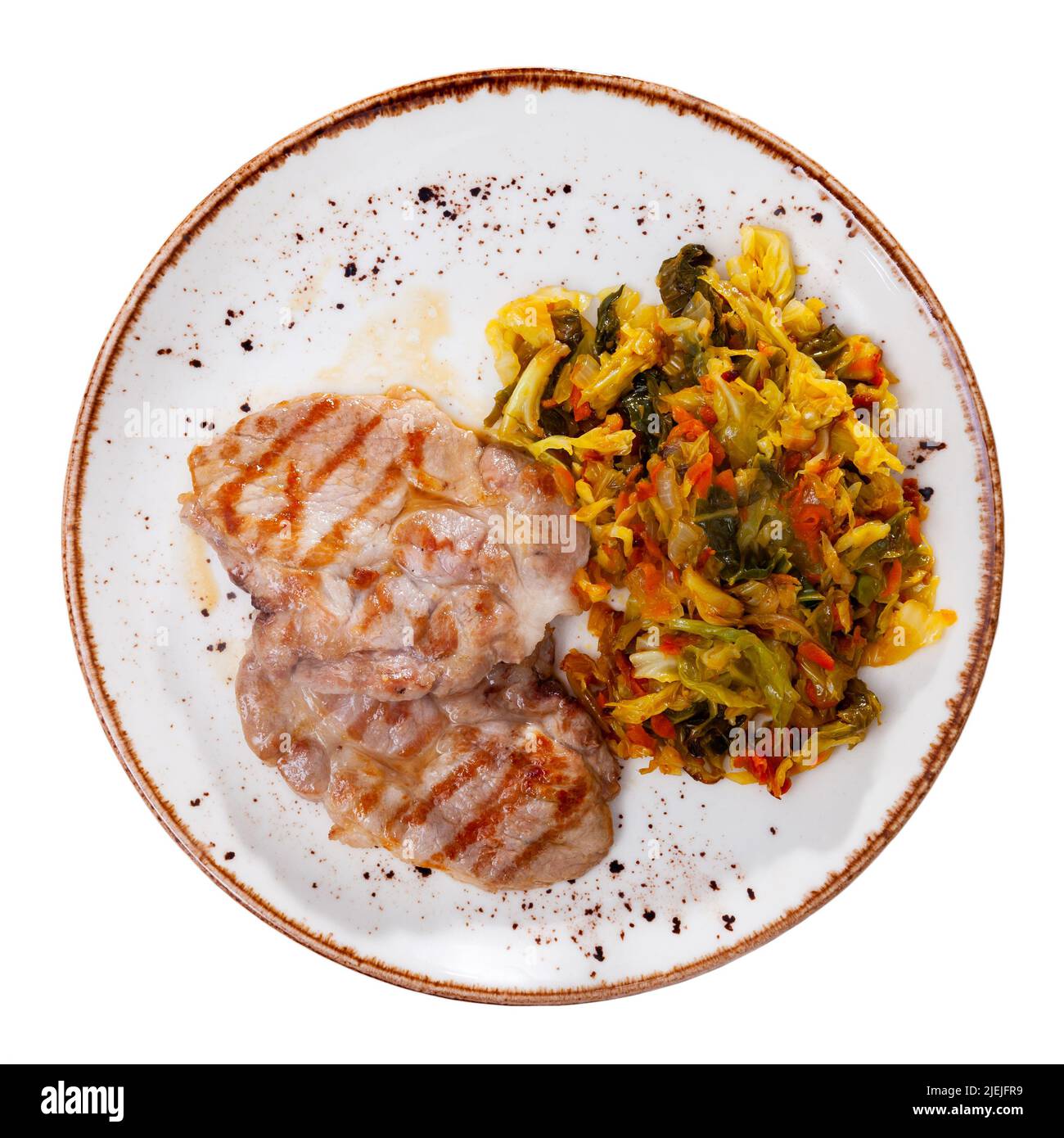 Portion of pork meat with stewed cabbage Stock Photo - Alamy