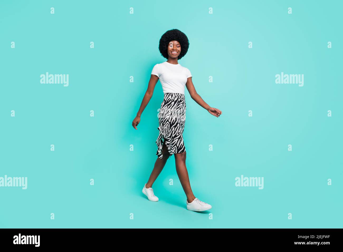 Full body photo of happy afro american pretty lady walk empty space ...