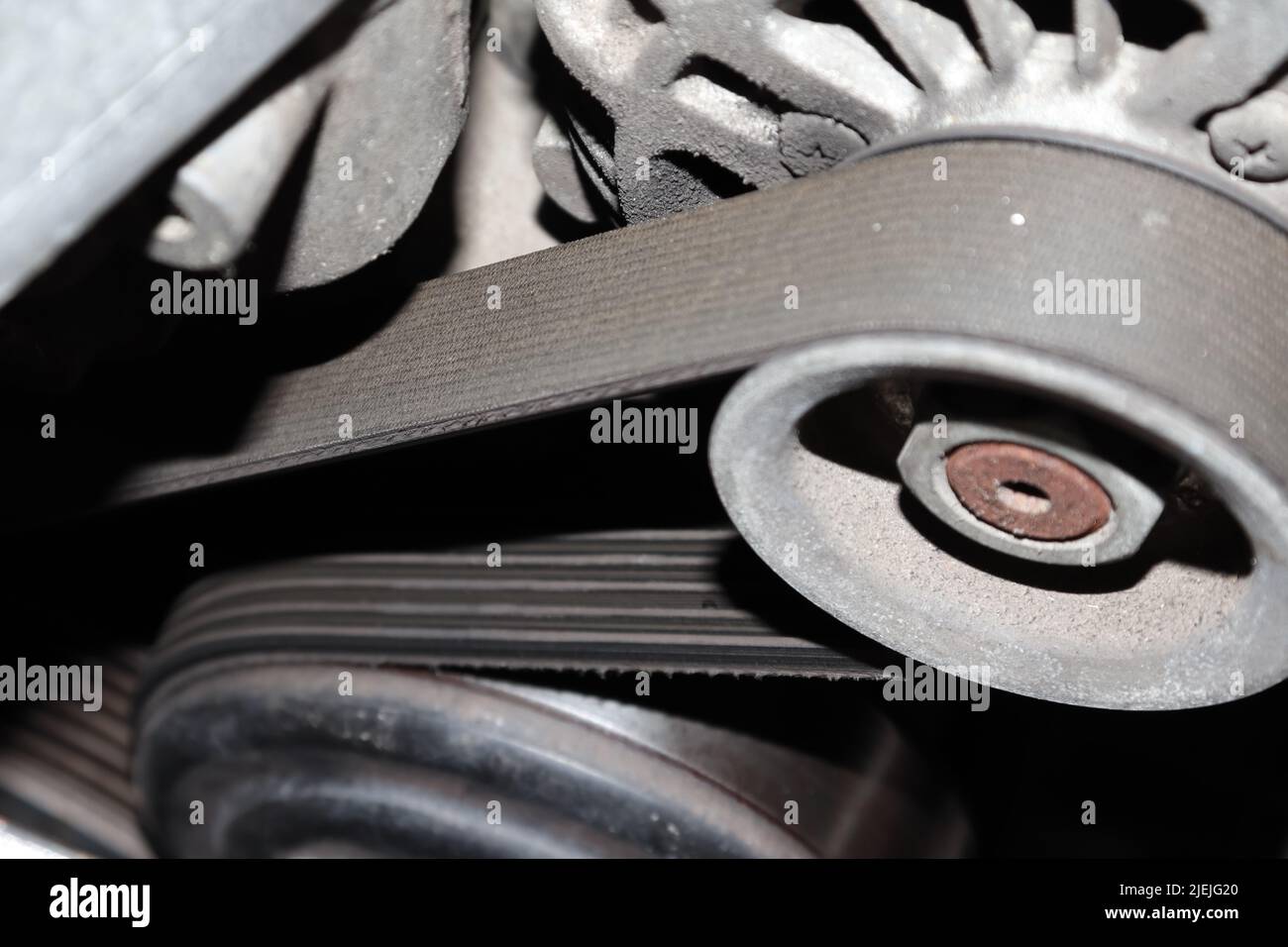 Check the belt on the engine Stock Photo - Alamy