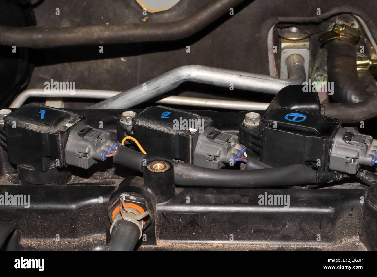 Maintenance spark plug of car Stock Photo - Alamy