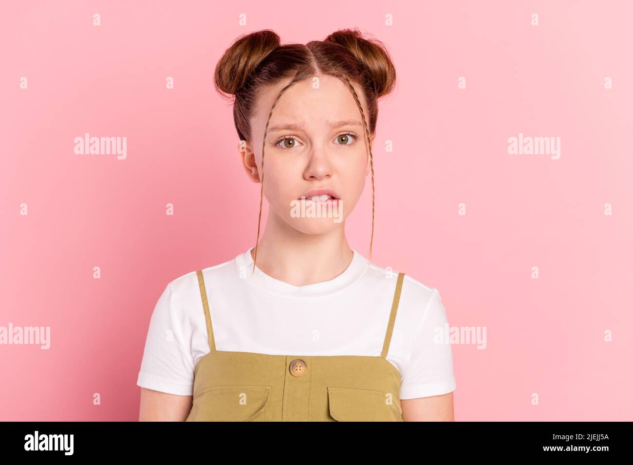 Portrait of attractive sullen foxy girl biting lip expecting bad news ...