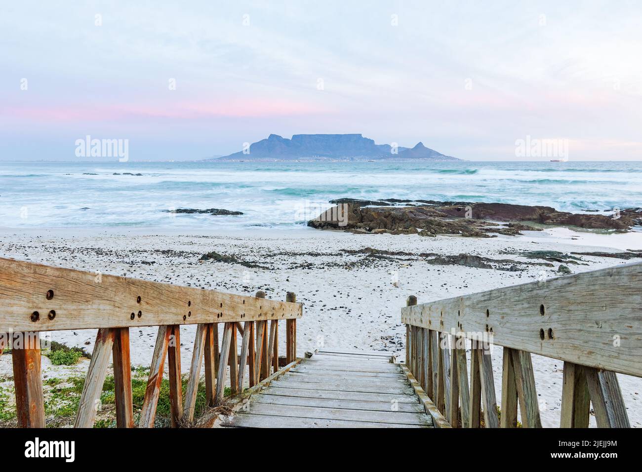 Stairway leading the eye down to a view of Table Bay and Table Mountain ...