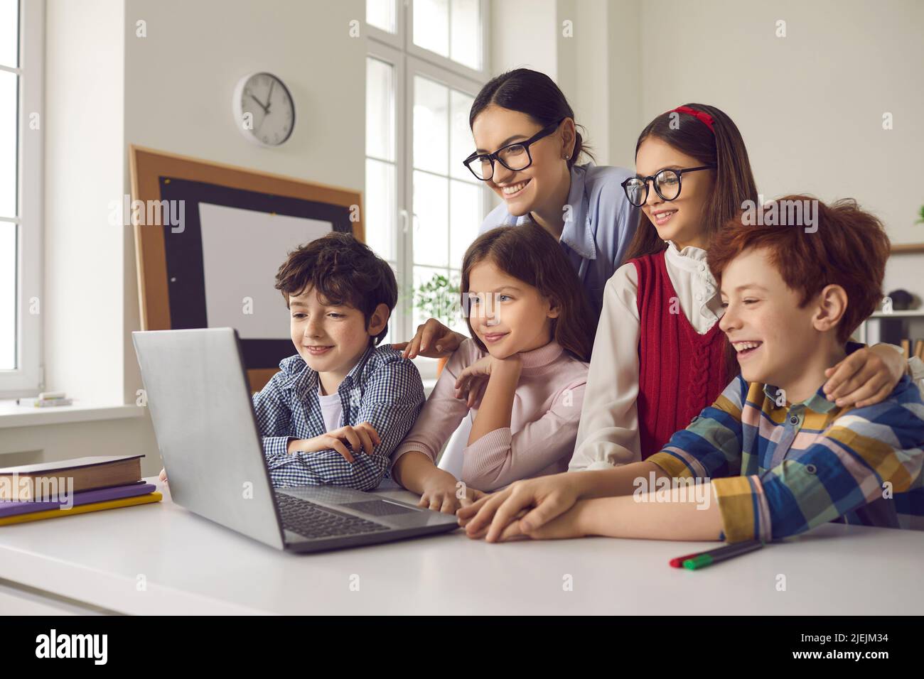 Teacher watching classroom hi-res stock photography and images - Alamy