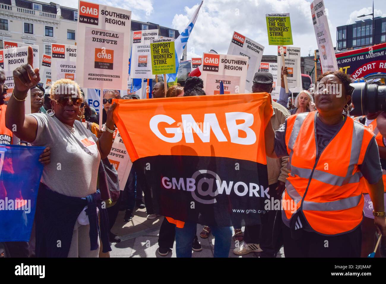 London, UK. 25th June 2022. GMB union cleaners march in protest against ...