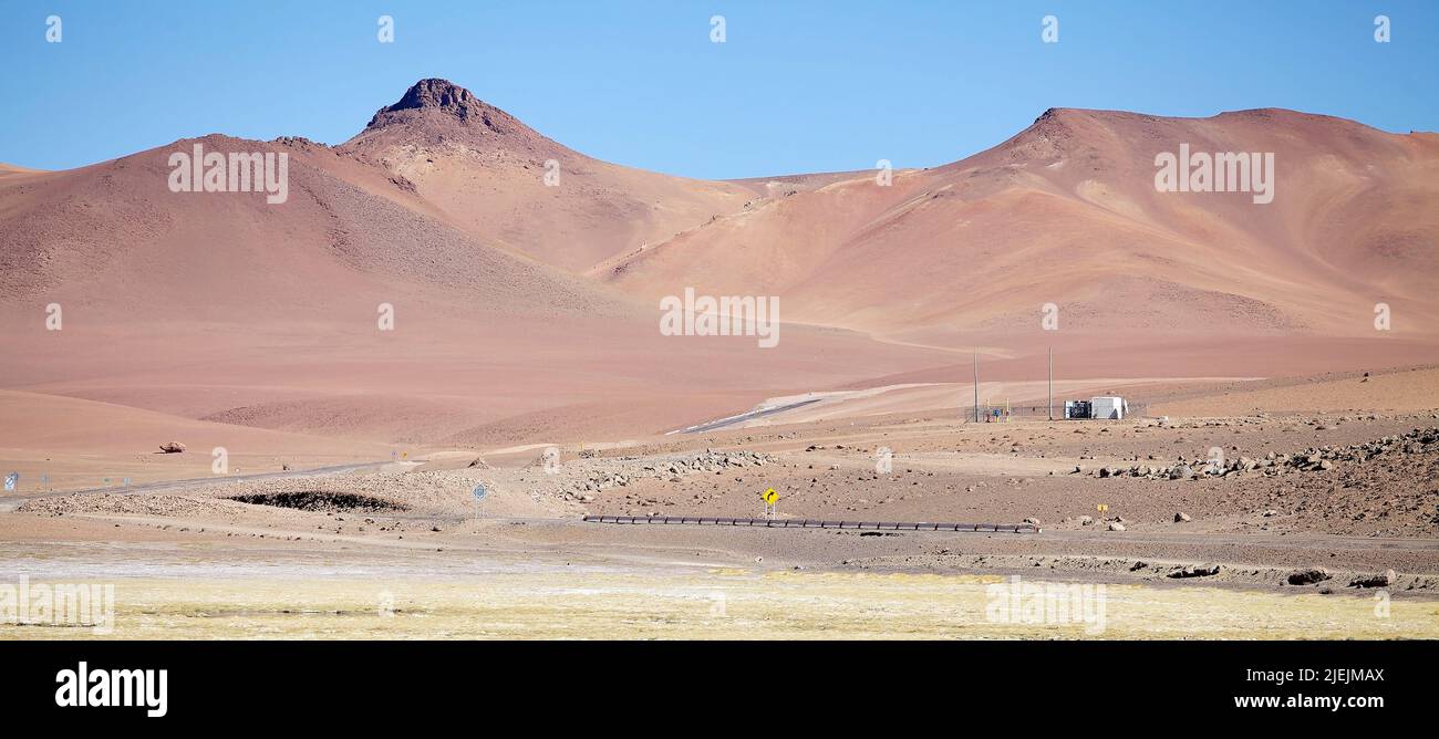 The road trought the Atacama desert, Chile. Atacama desert is a plateau ...