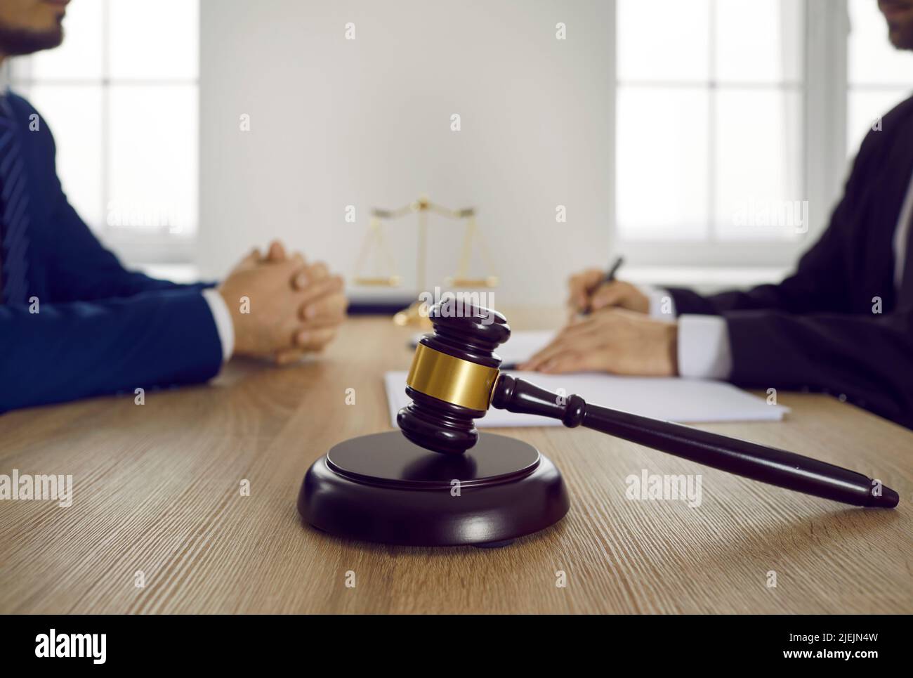 Close up of gavel on office desk of lawyer who is giving legal ...