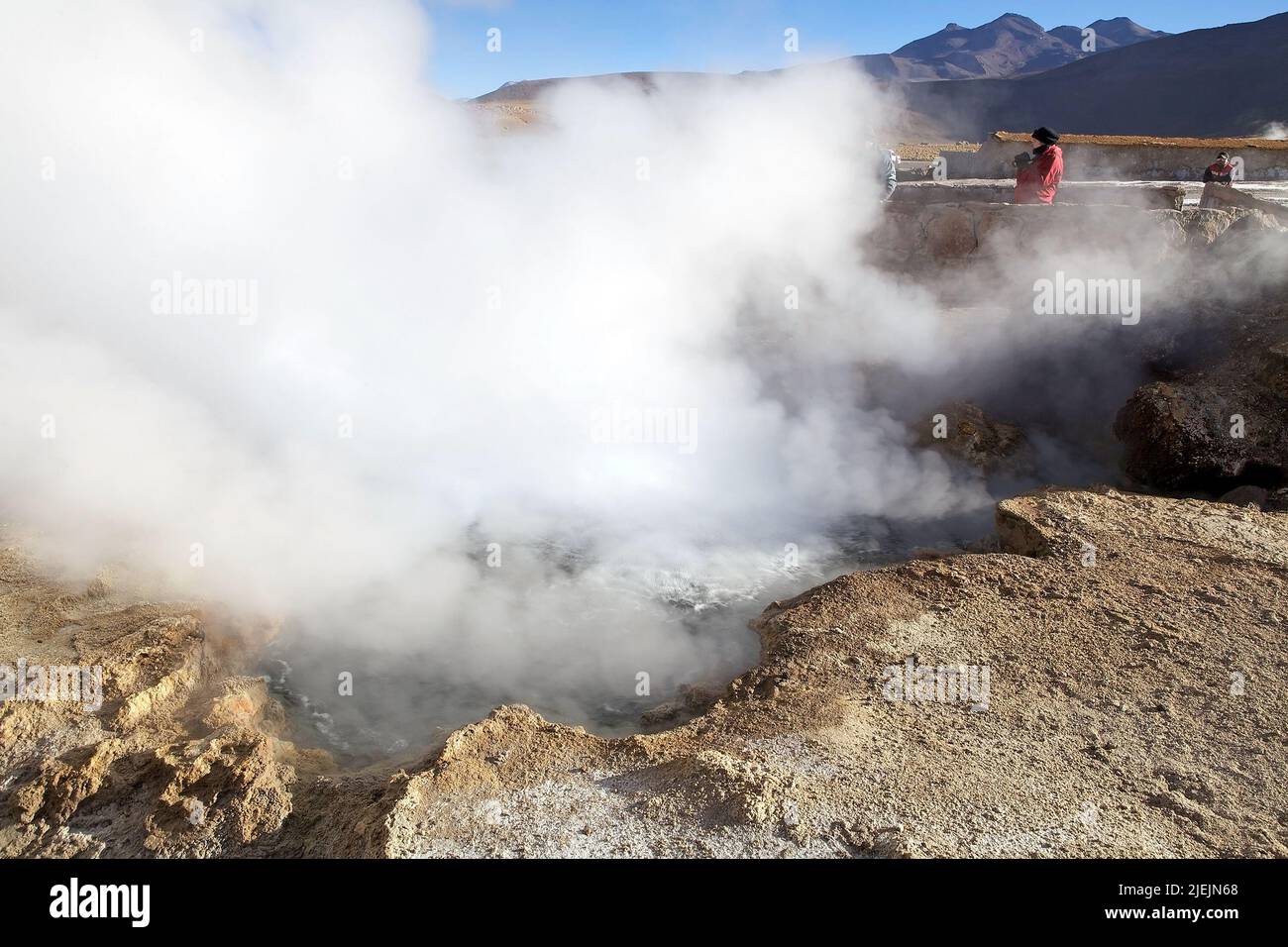 Tourists are visiting the El Tatio geysers, Chile. El Tatio is a geyser ...