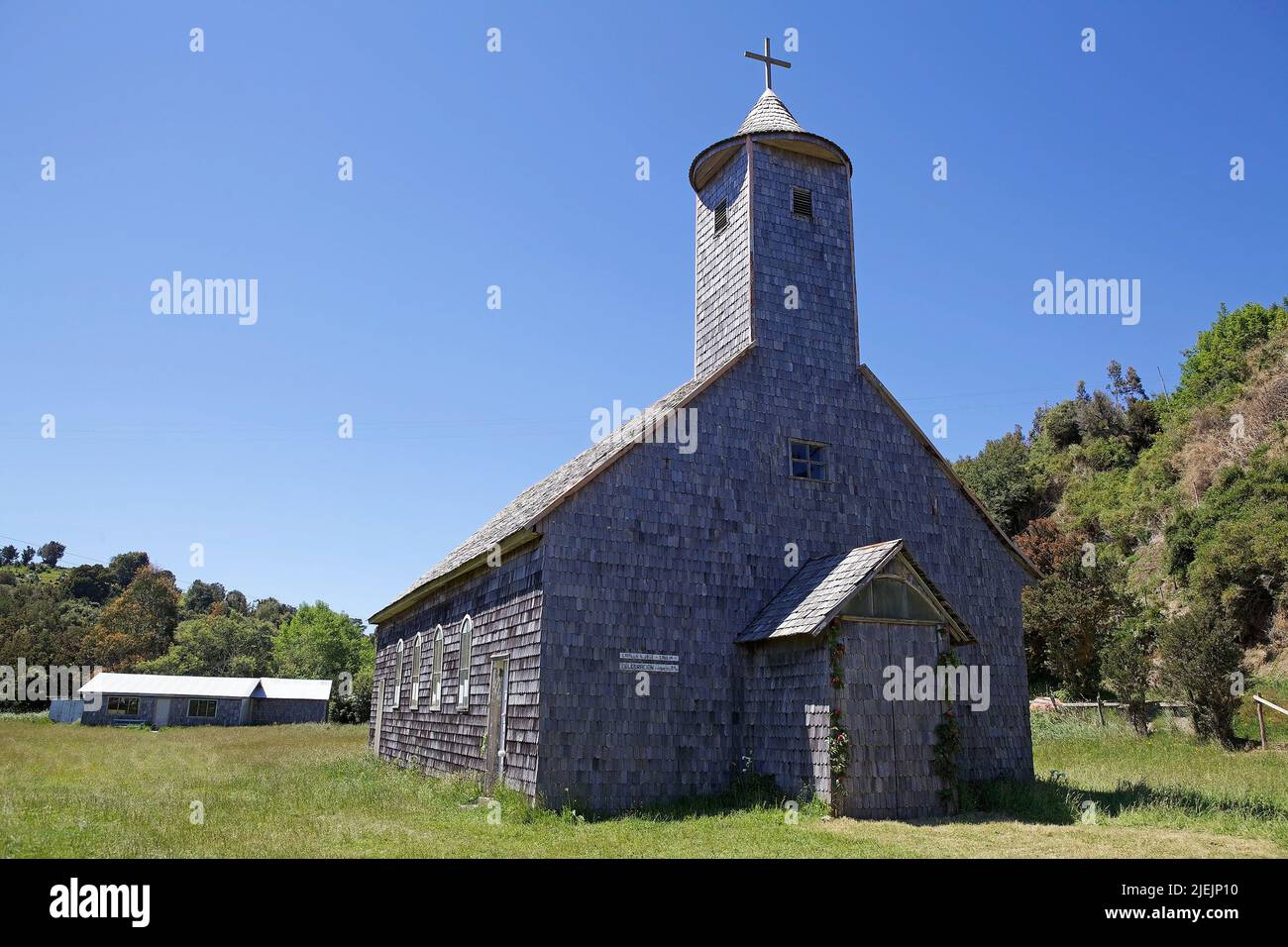 Traditional wodden church at the Caulin village in the Chiloe island ...