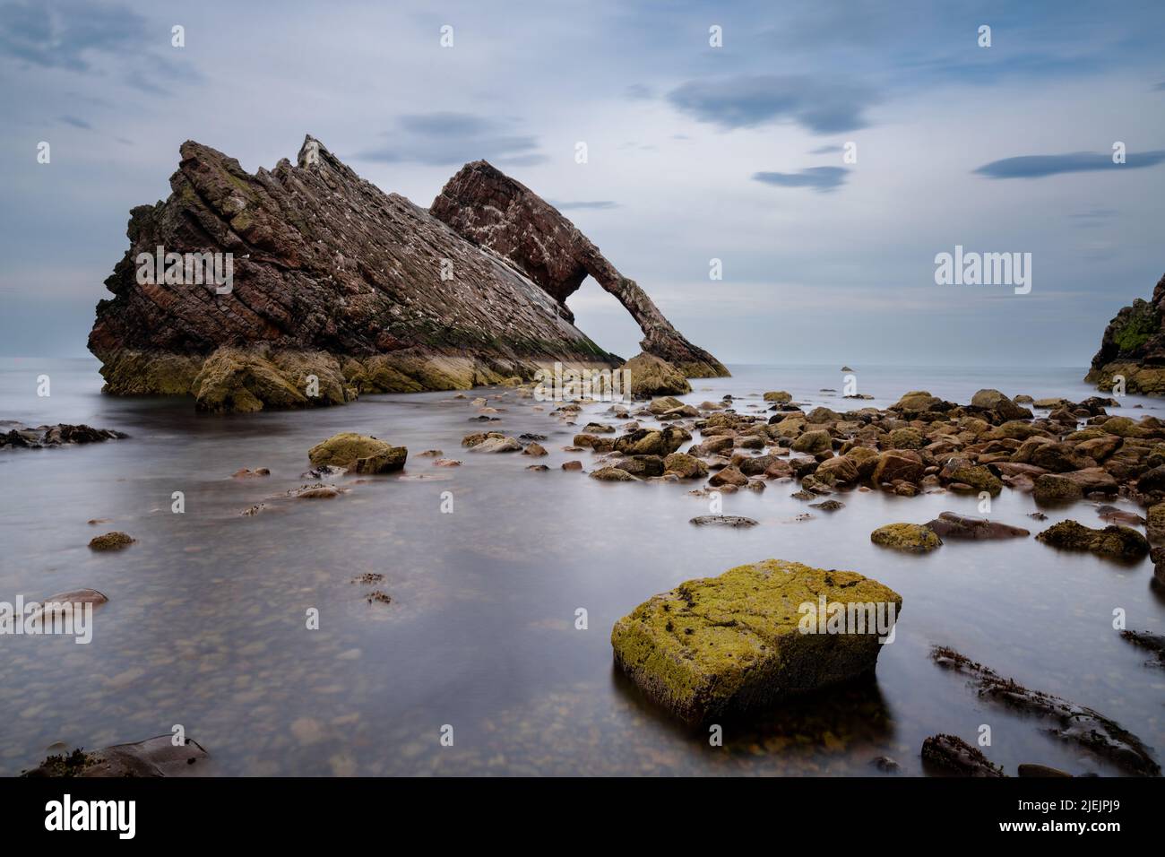 A view of the landmark Bow Fiddle Rock near Portknockie on the coast of ...