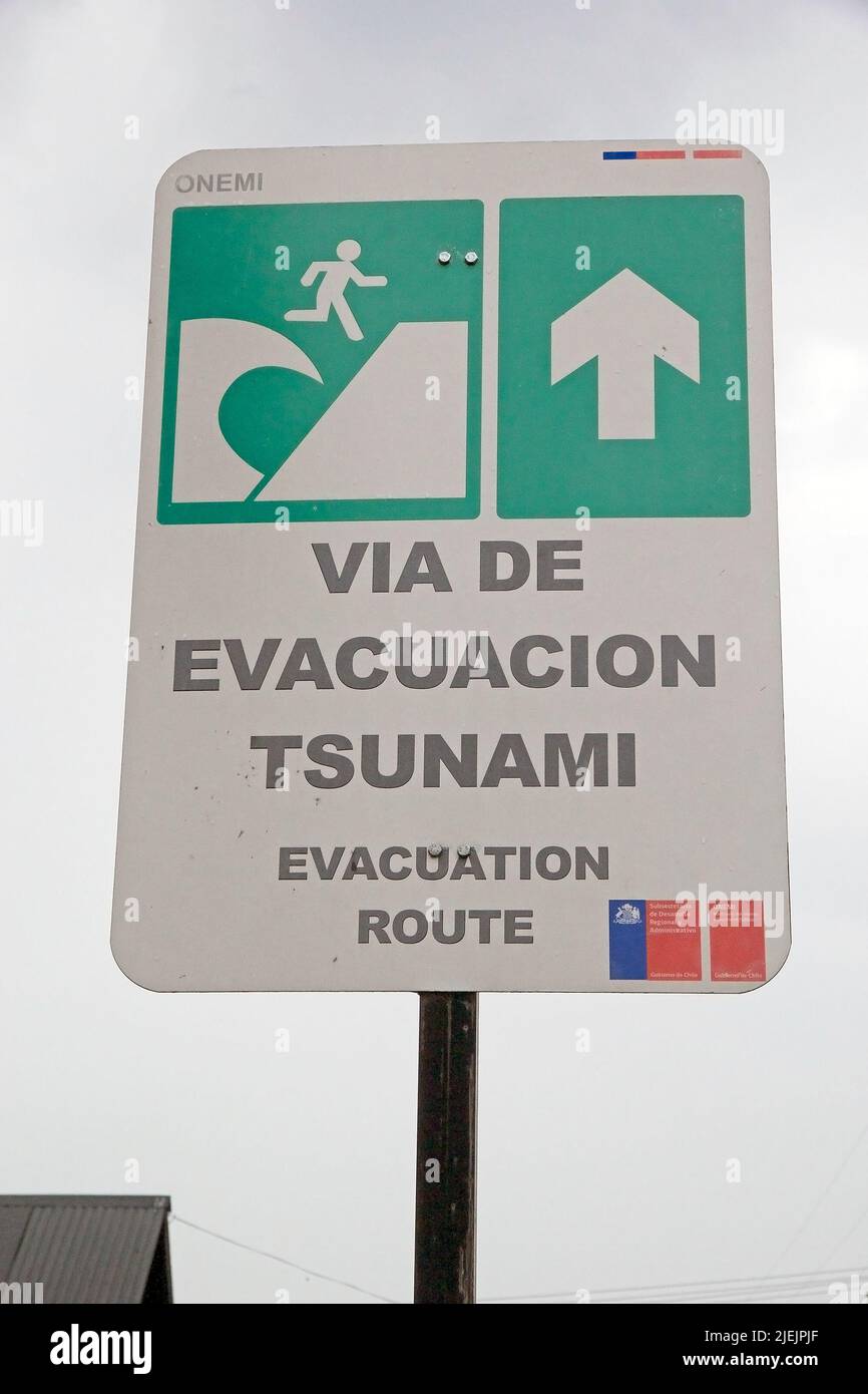 Chilean tsunami warning sign in the town of Curaco de Velez in Quinchao ...