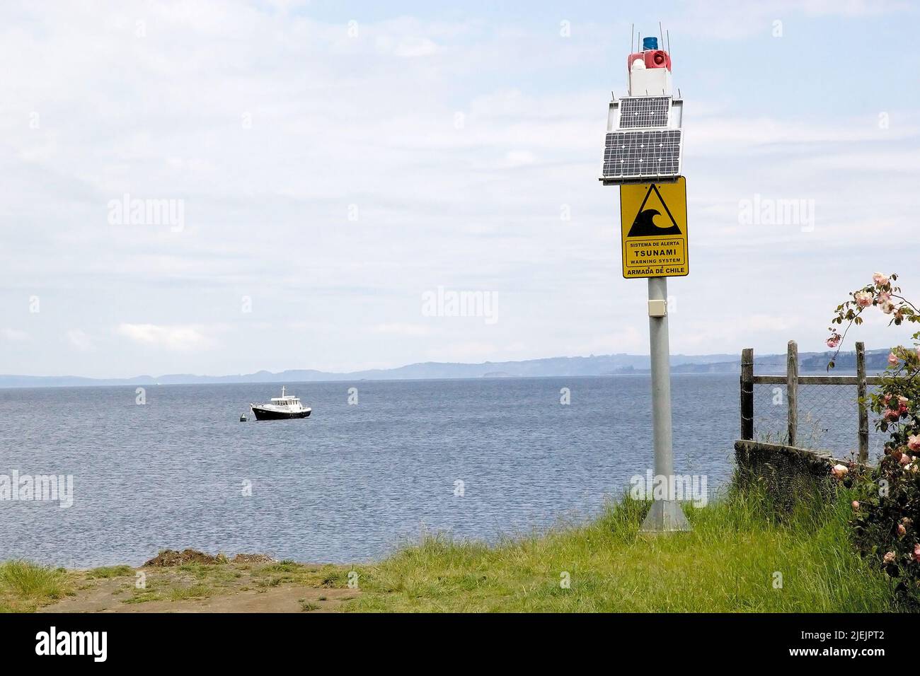 Chilean tsunami warning sign in the town of Dalcahue, Chiloe Island ...